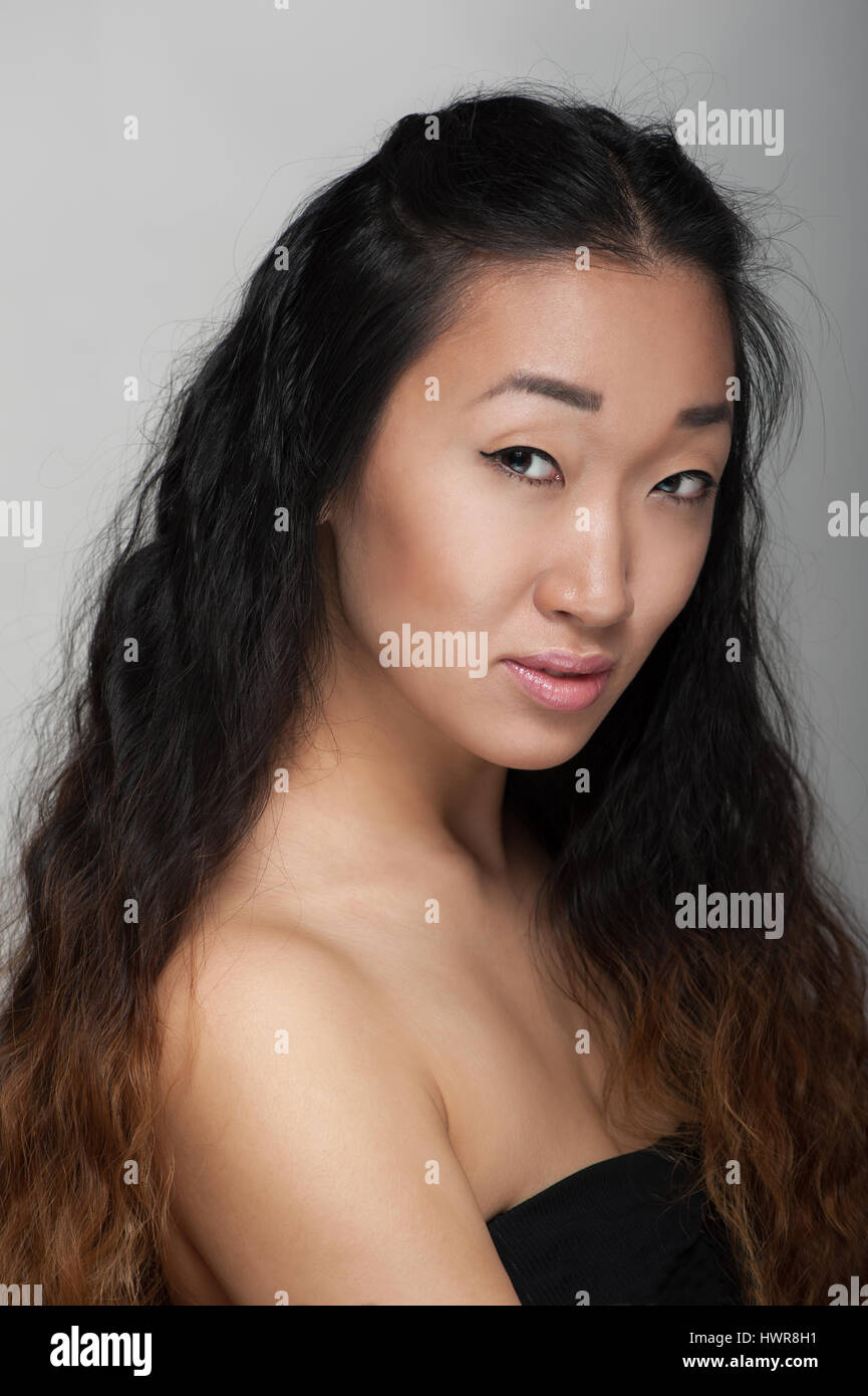 Portrait of woman in studio Stock Photo - Alamy