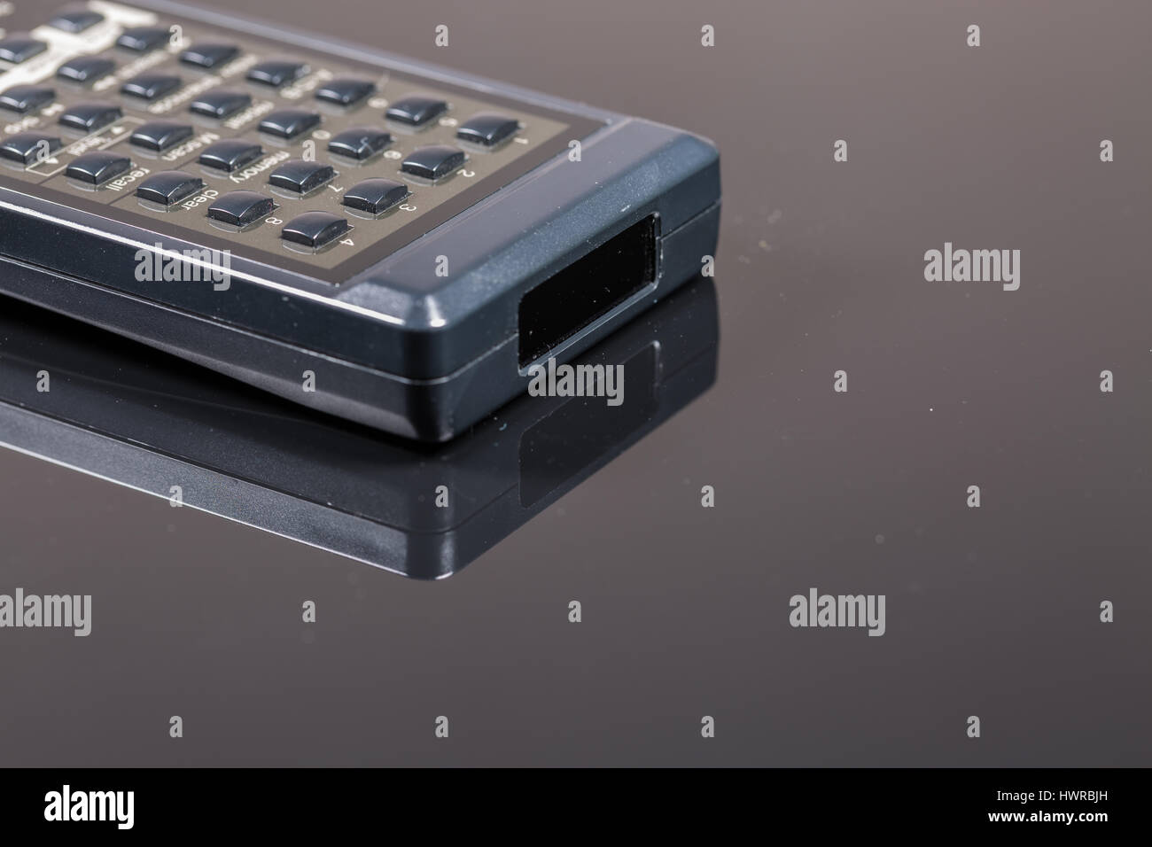 Remote control on table Stock Photo - Alamy