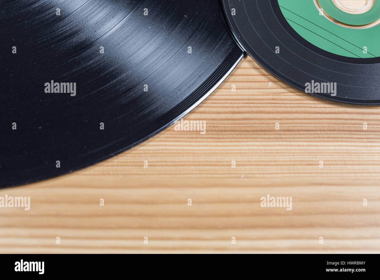 Vinyl Record On Wood Stock Photo - Alamy