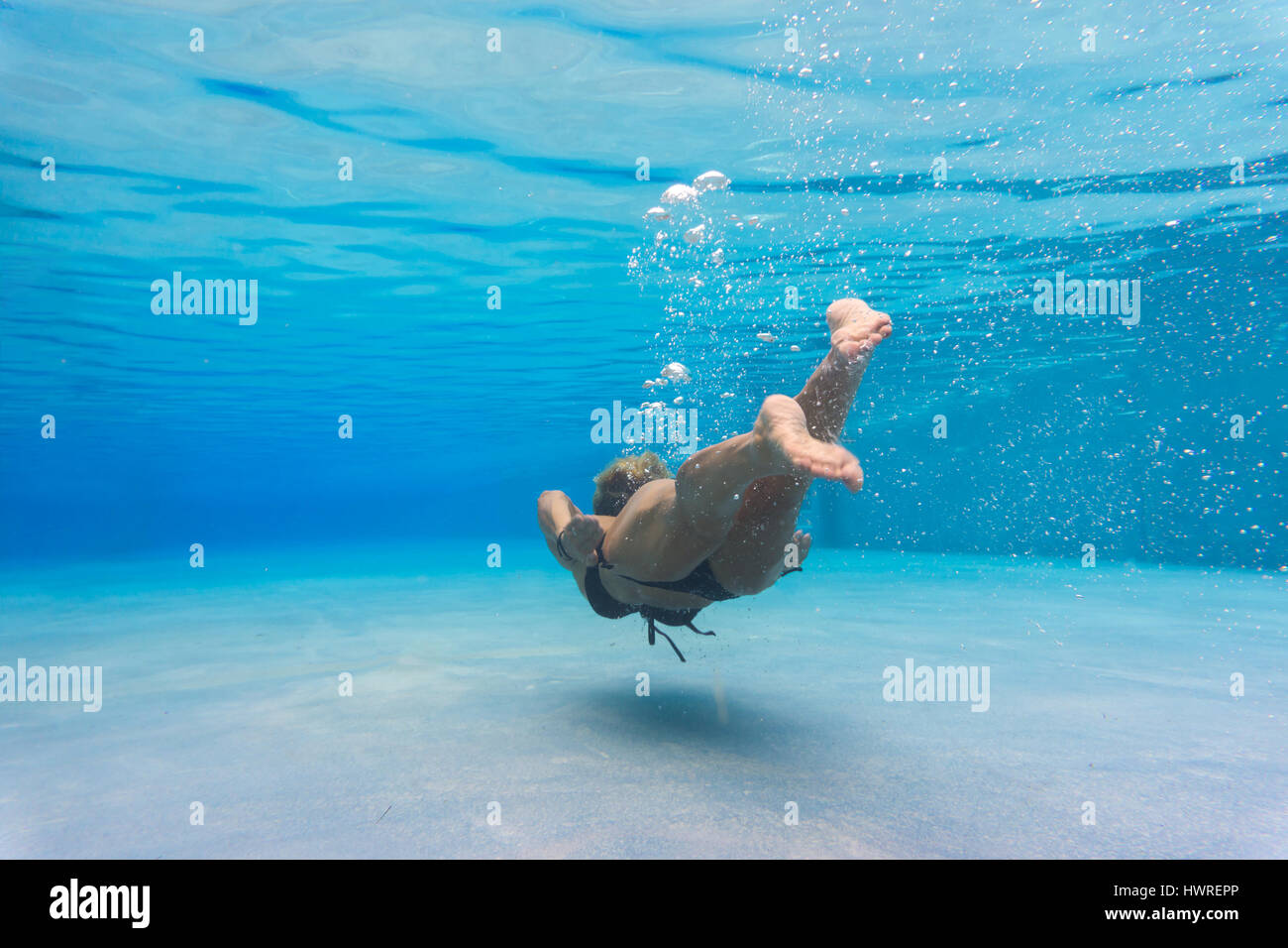 Black woman underwater swimmer hi-res stock photography and images - Alamy