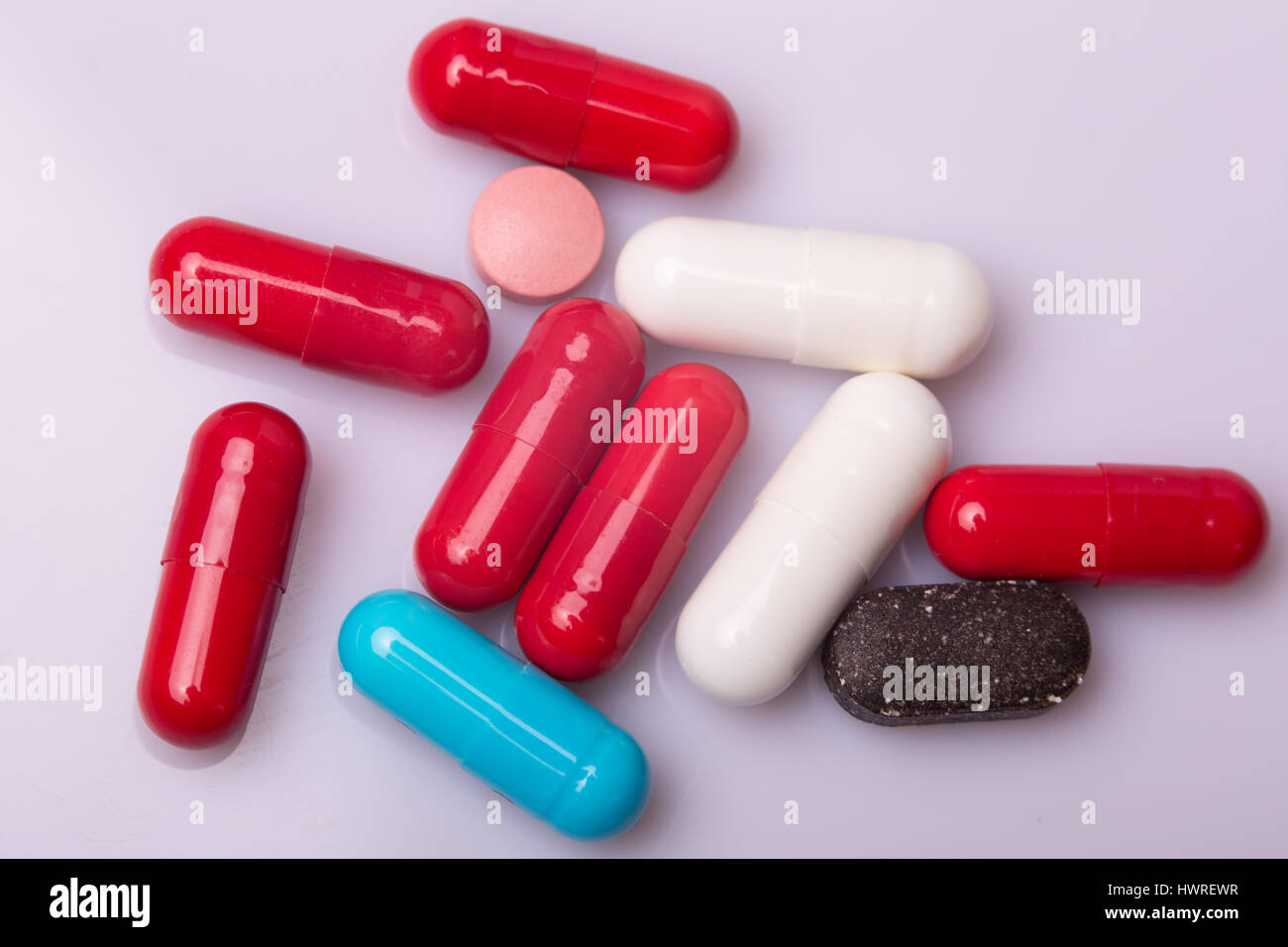 different Tablets pills capsule heap mix therapy drugs Stock Photo - Alamy