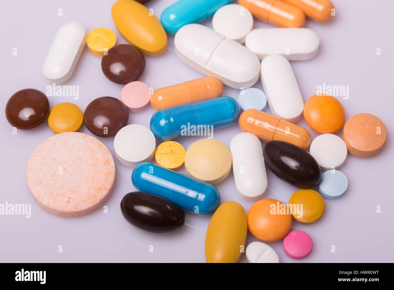 different Tablets pills capsule heap mix therapy drugs Stock Photo - Alamy