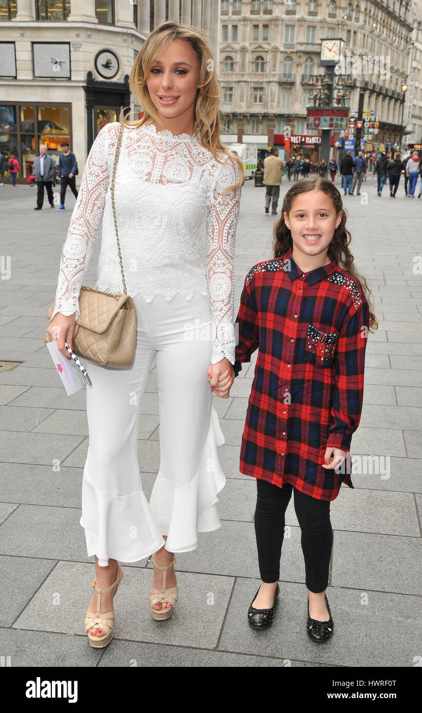 London, UK. Amber Dowding and guest at the "Smurfs: The Lost Village ...