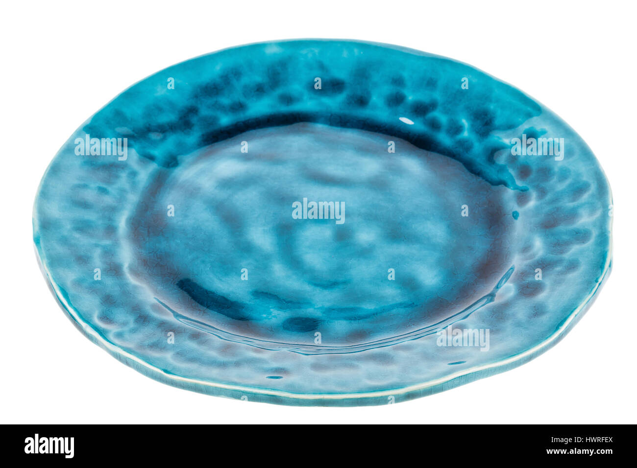 Blue handmade pottery plate isolated on white background Stock Photo ...