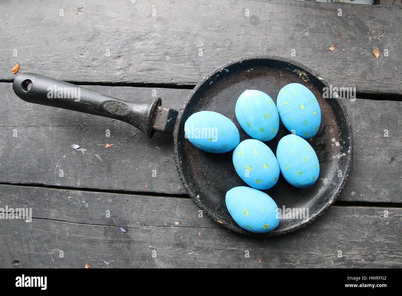 Easter eggs in a frying pan. Creative concept Stock Photo - Alamy