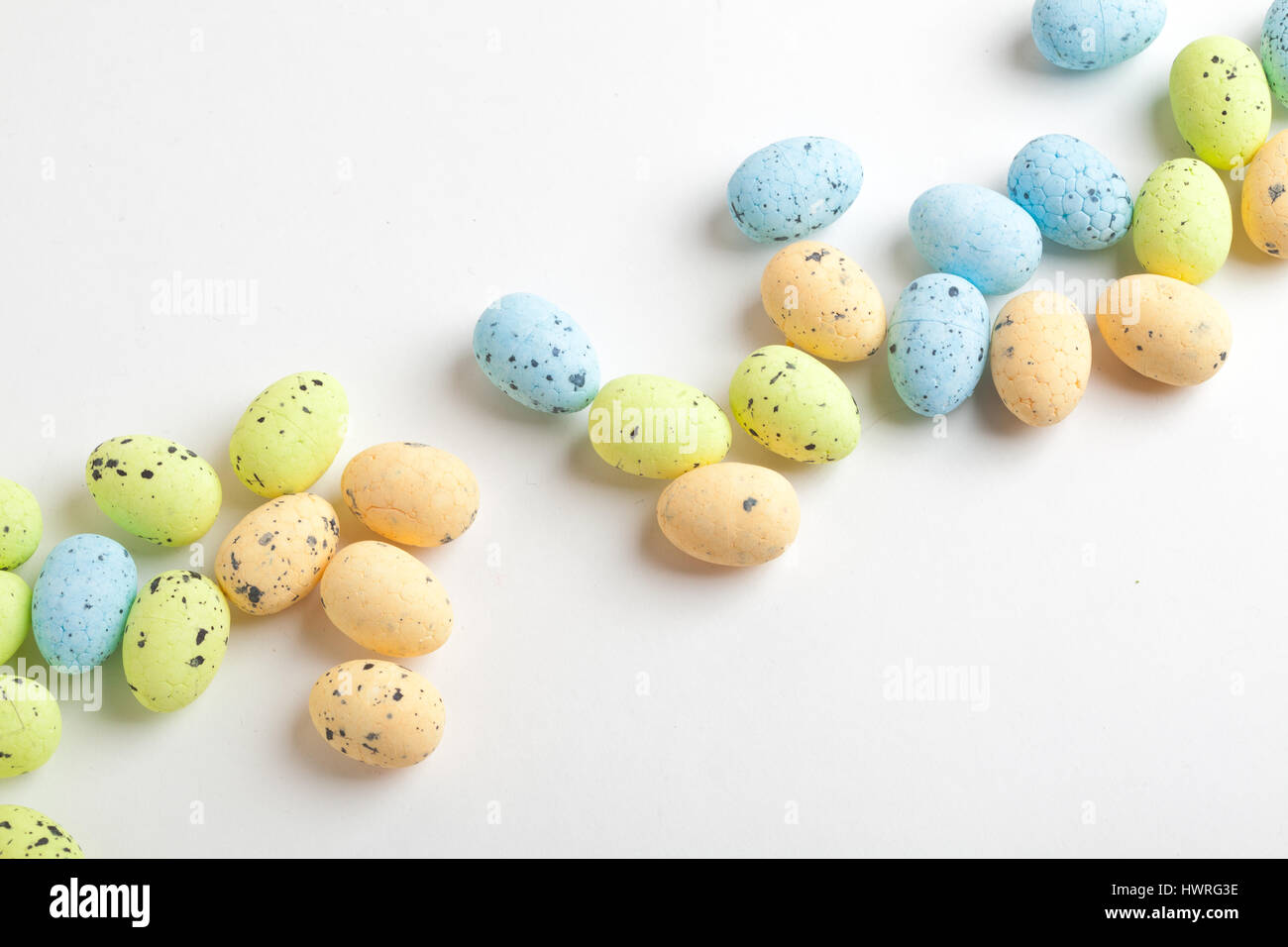 Colorful easter eggs over light background. Studio shot Stock Photo - Alamy