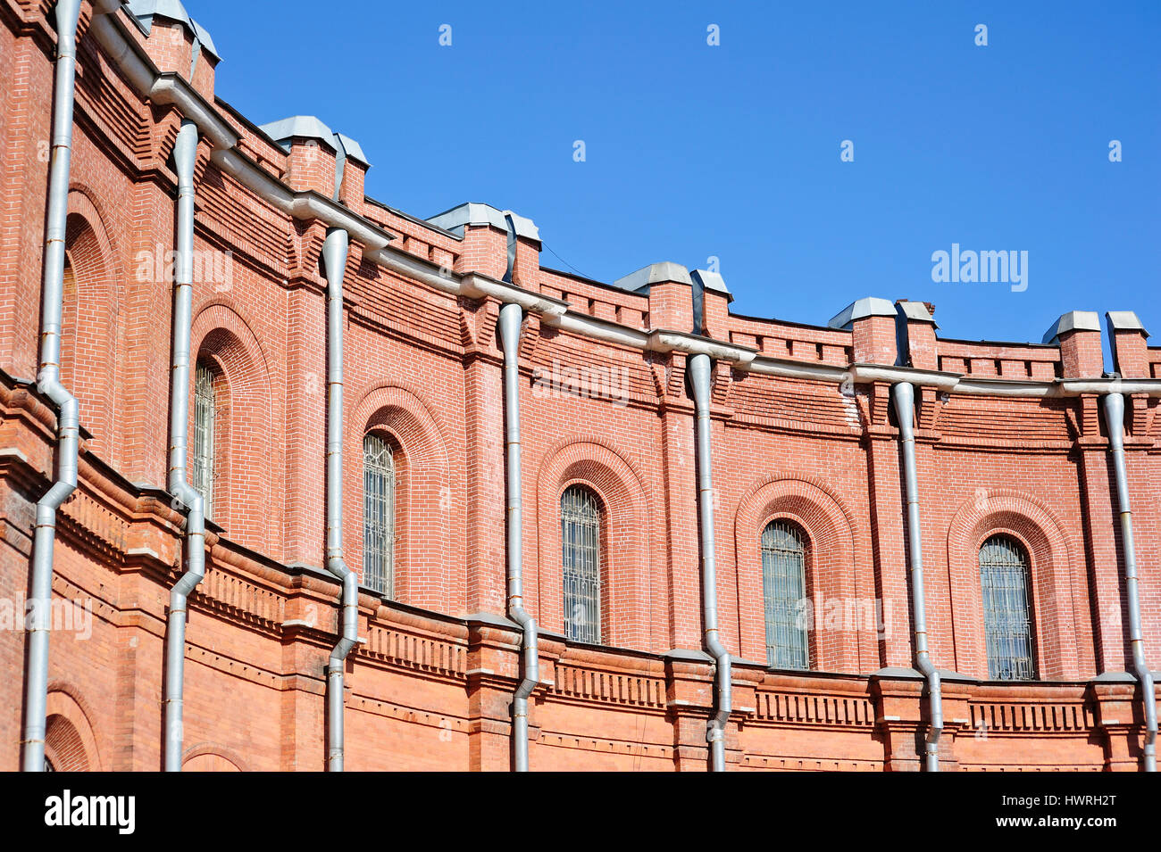 Round brick wall with windows Stock Photo - Alamy