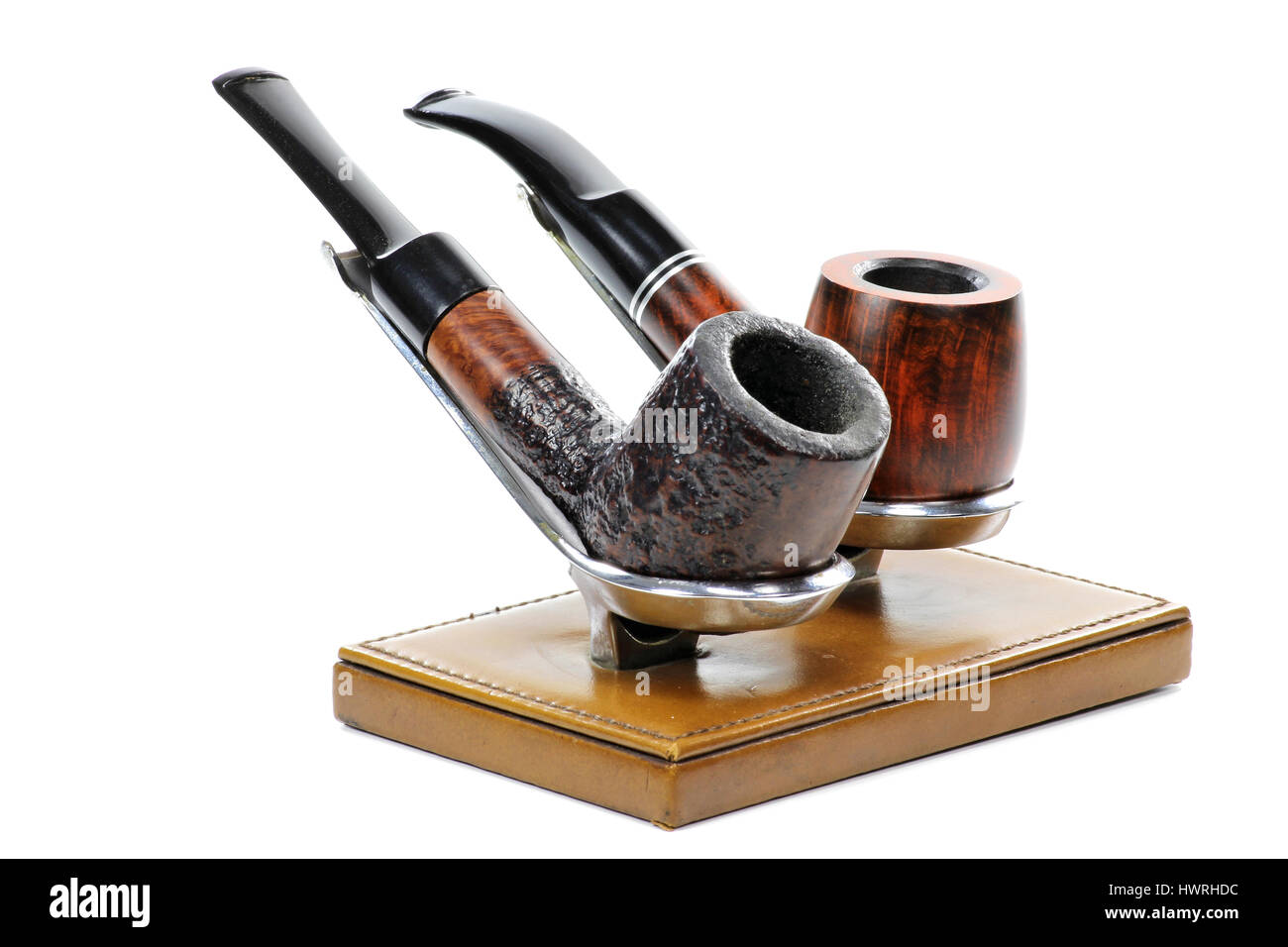 briar pipes on rack isolated on white background Stock Photo - Alamy