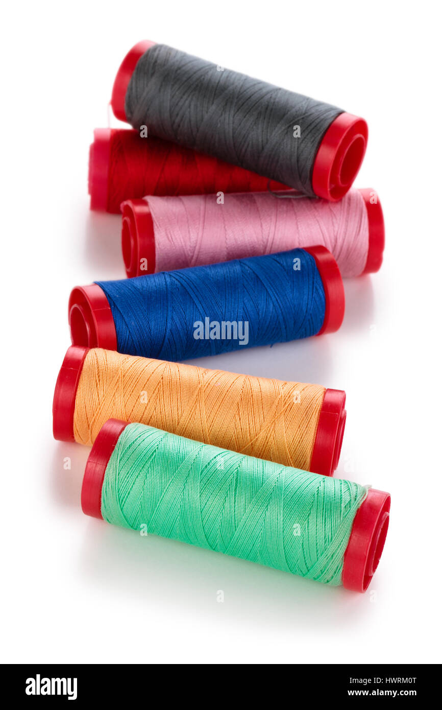 Collection of colorful spools. Isolated on white background Stock Photo ...