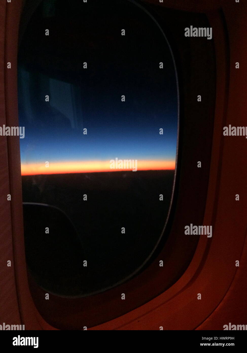 Colorful Sunset Horizon as seen from an airplane window Stock Photo - Alamy