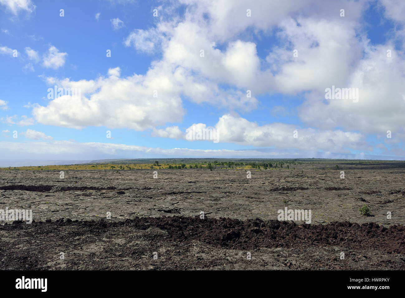 old lava and cloudy sky in the Big Island of Hawaii, Volcanoes National ...