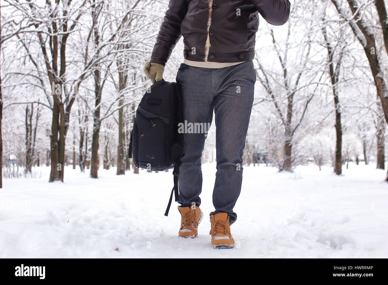 bearded man walking in a winter park Stock Photo - Alamy