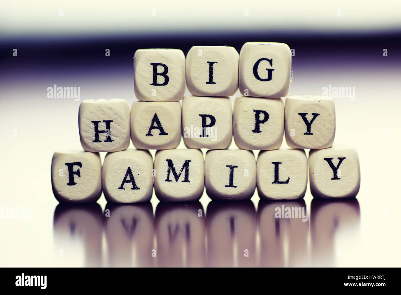 wood text cube family Stock Photo - Alamy