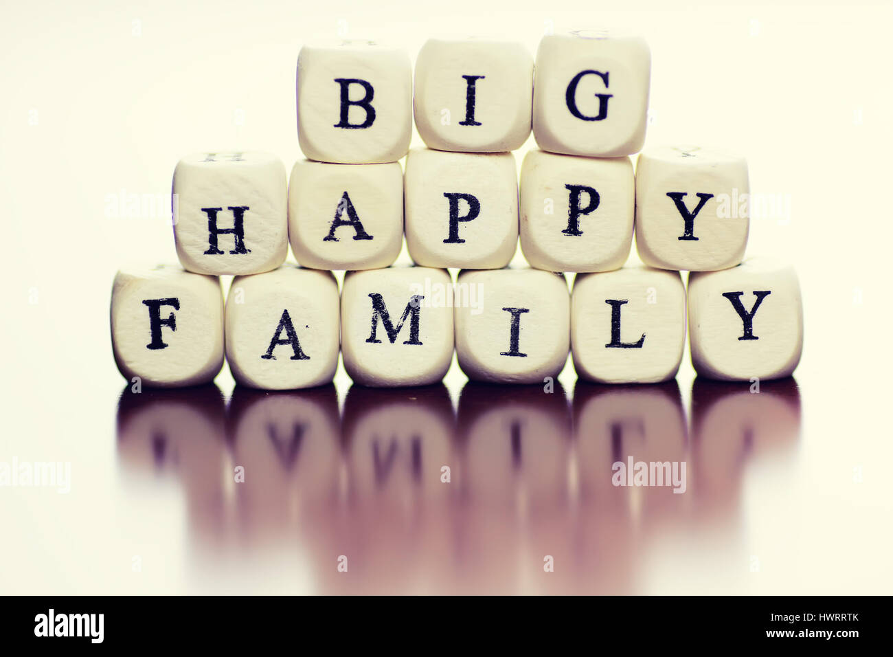 wood text cube family Stock Photo - Alamy