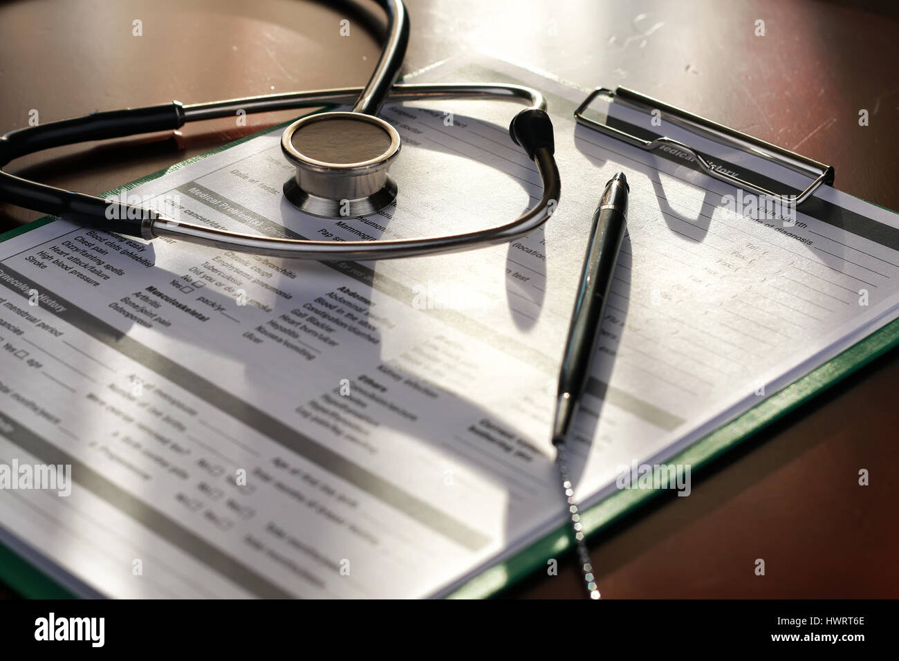stethoscope medical documents pen Stock Photo - Alamy