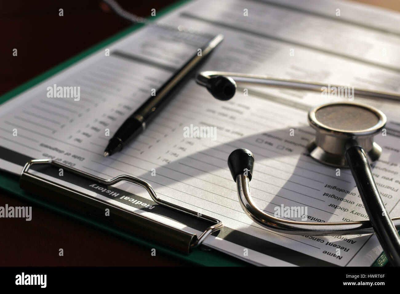 stethoscope medical documents pen Stock Photo - Alamy