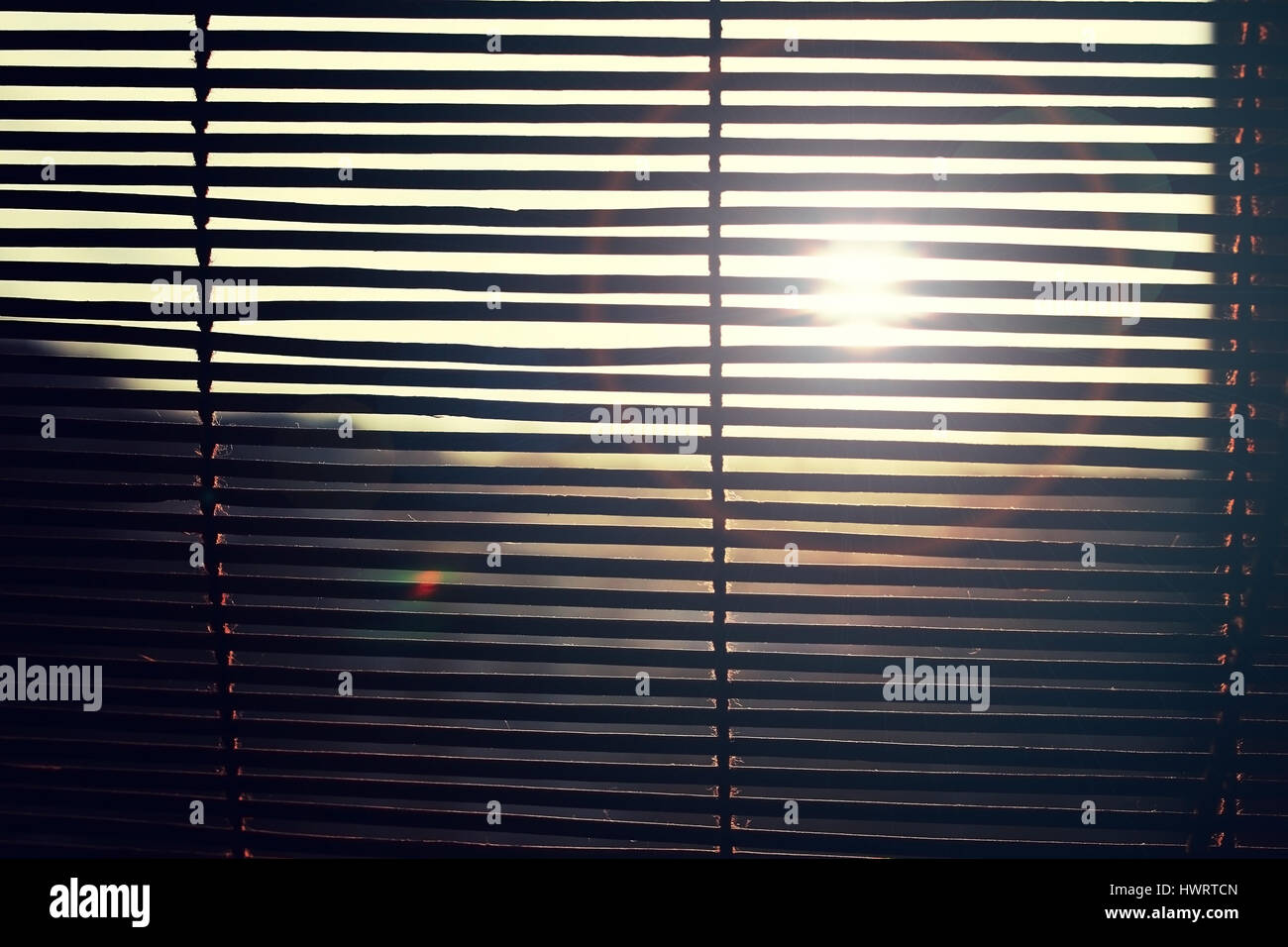 sun is shining through wood blinds Stock Photo - Alamy