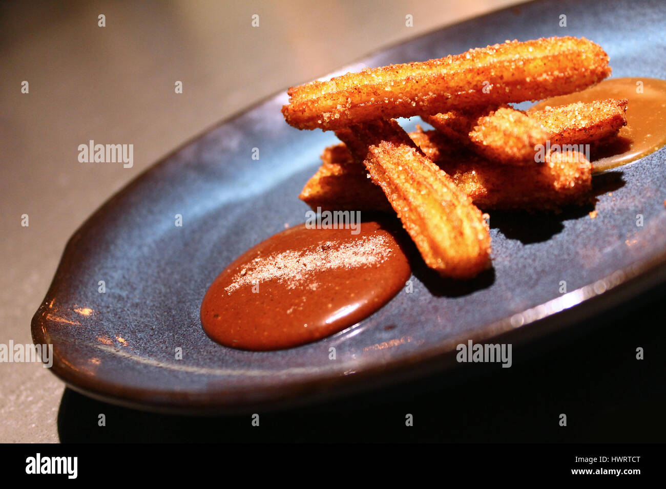 Traditional Mexican churros dessert Stock Photo - Alamy