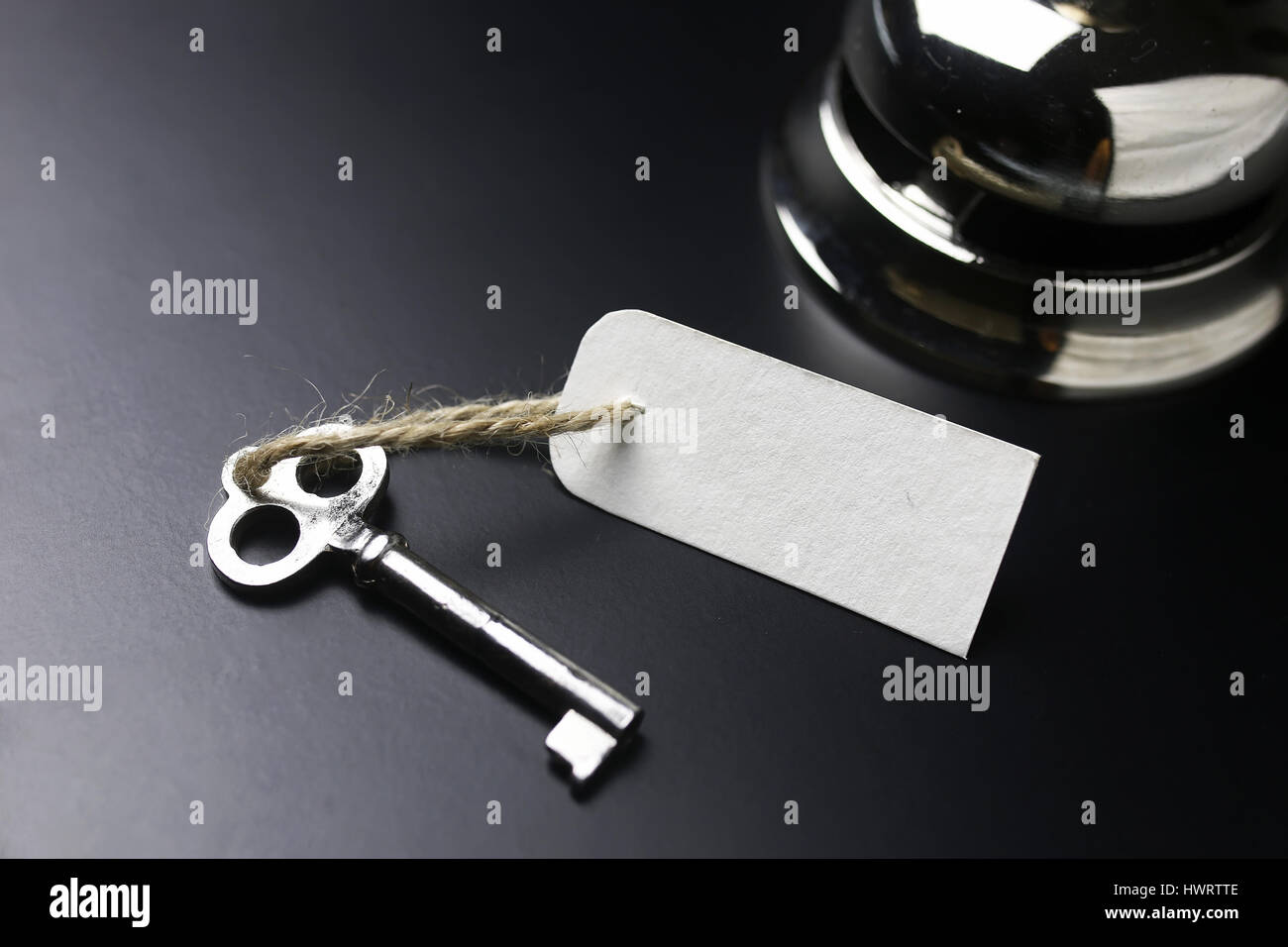 bell and the key at the reception in the hotel Stock Photo - Alamy