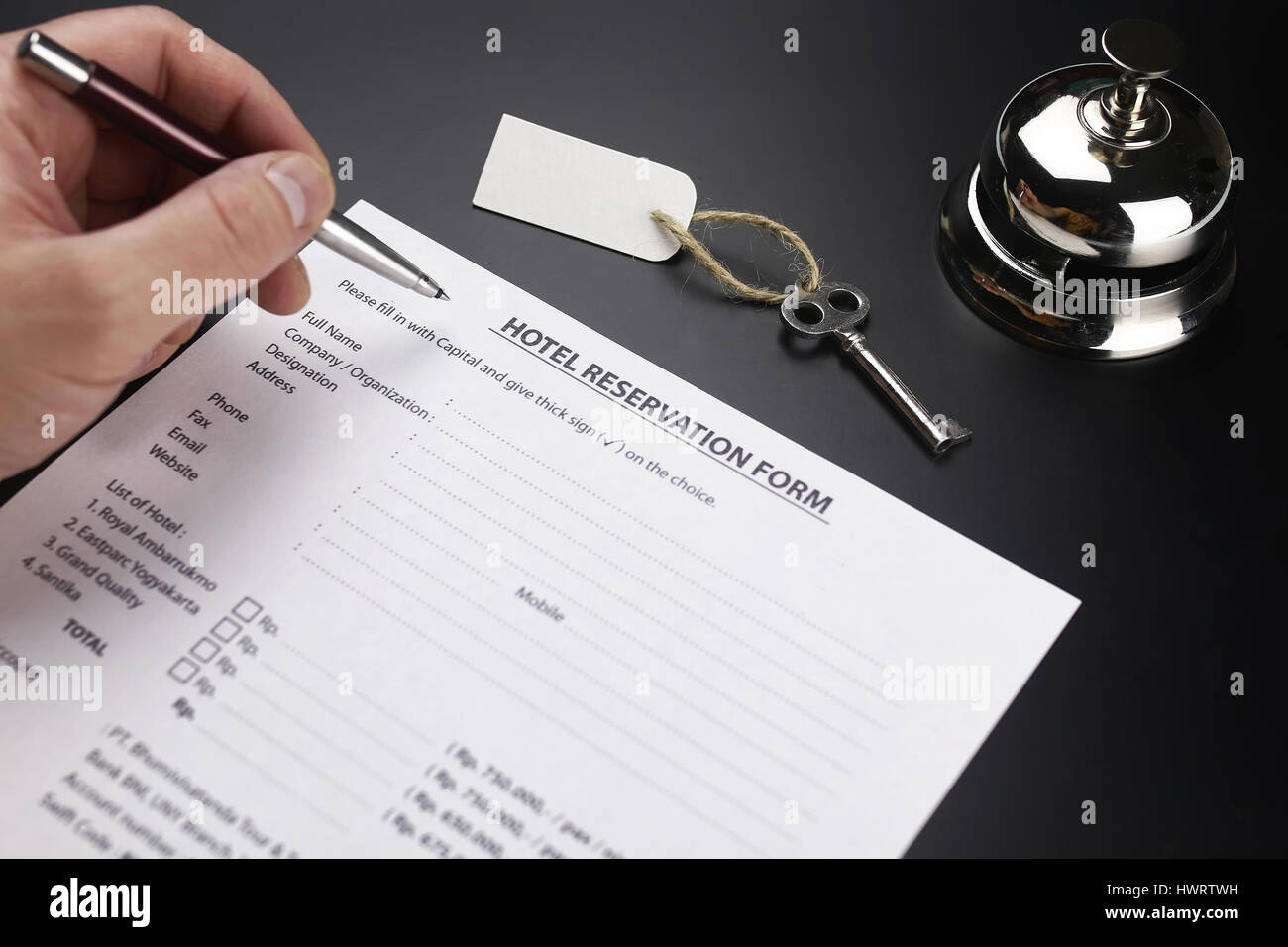 bell and the key at the reception in the hotel Stock Photo - Alamy