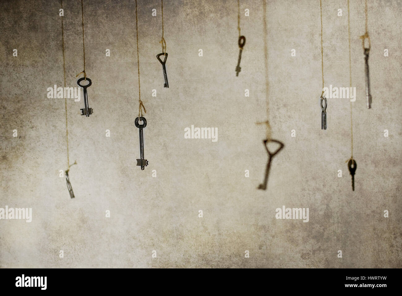 hand stretching for one of the many old vintage keys Stock Photo - Alamy