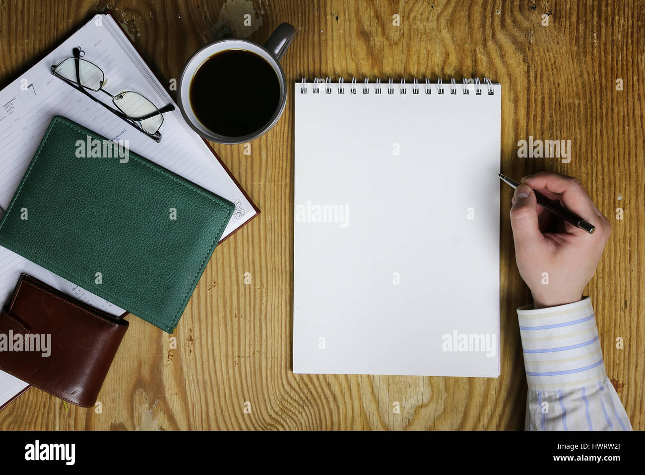 table write hand office view Stock Photo - Alamy