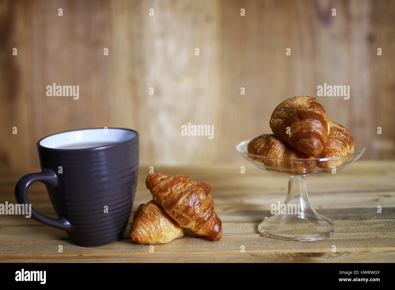 cup croissant breakfast wooden background Stock Photo - Alamy