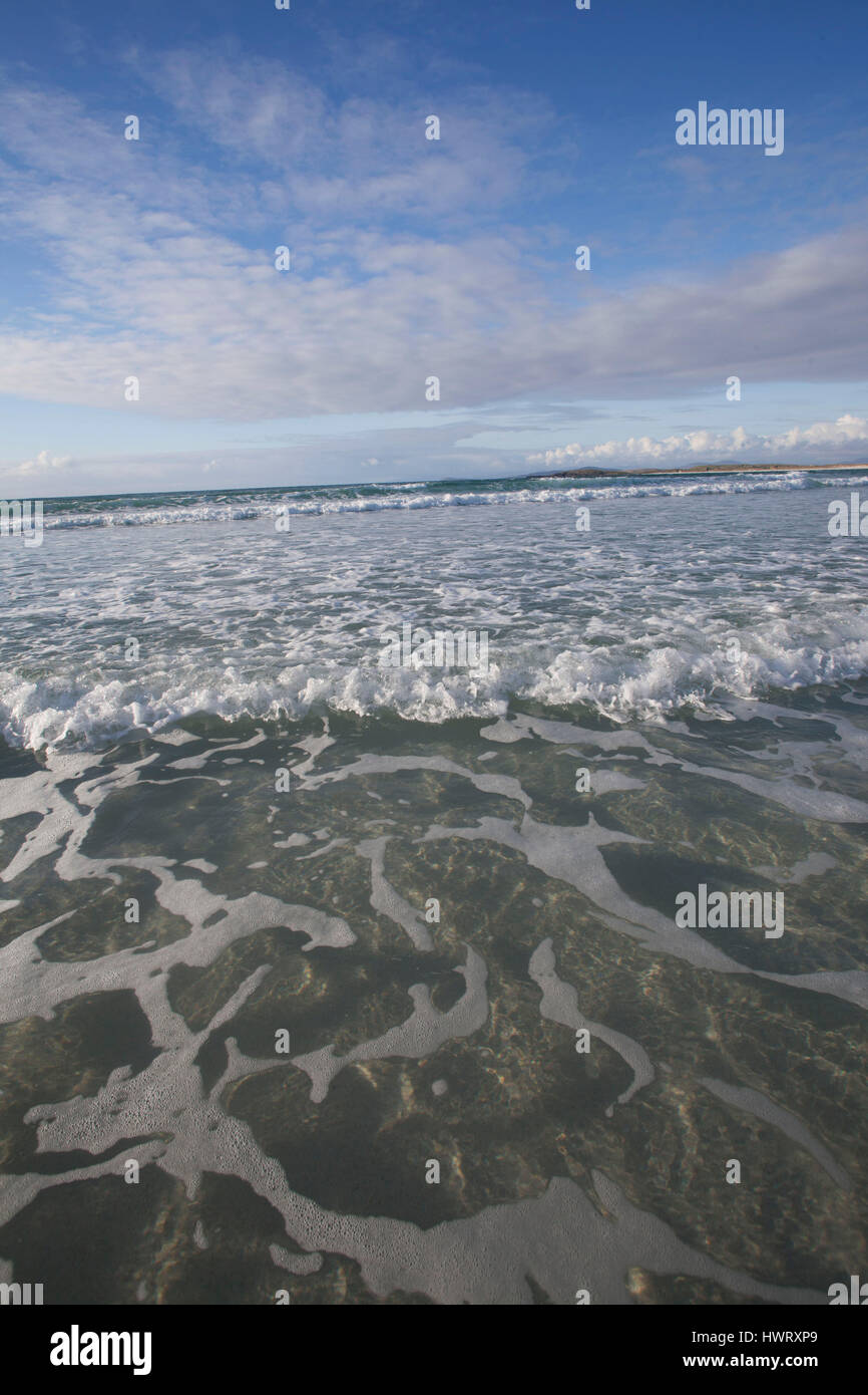 Waves breaking on beautiful remote beach Stock Photo - Alamy