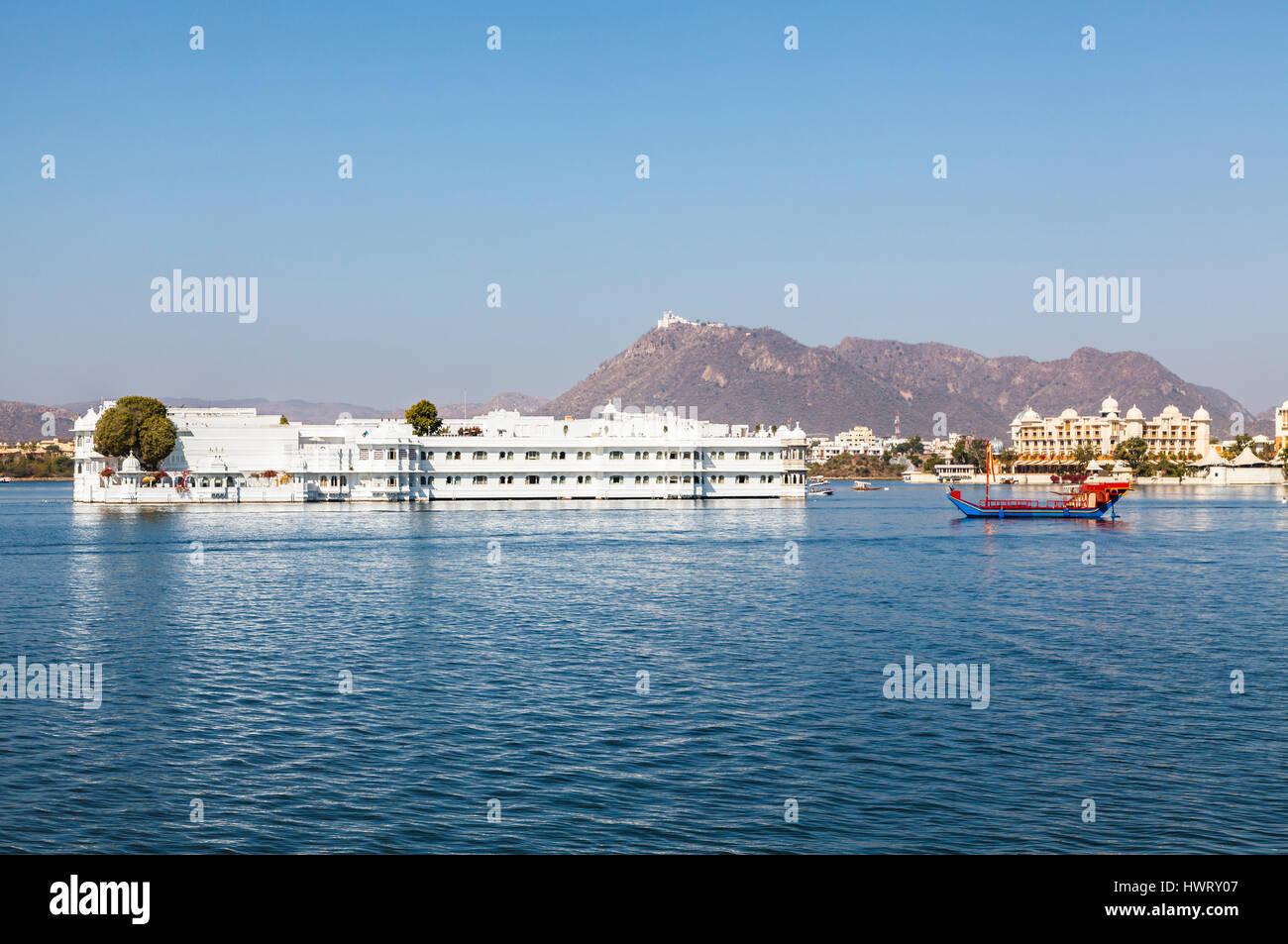 The exterior of the luxurious white Taj Lake Palace Hotel on Jag Niwas ...