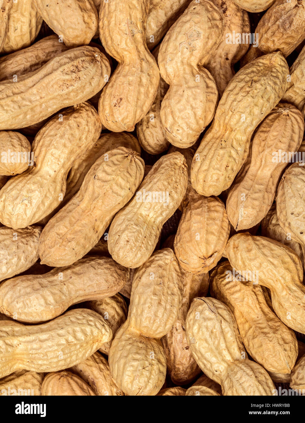 Peanuts in shell texture background. Raw peanuts on display at a farmer ...