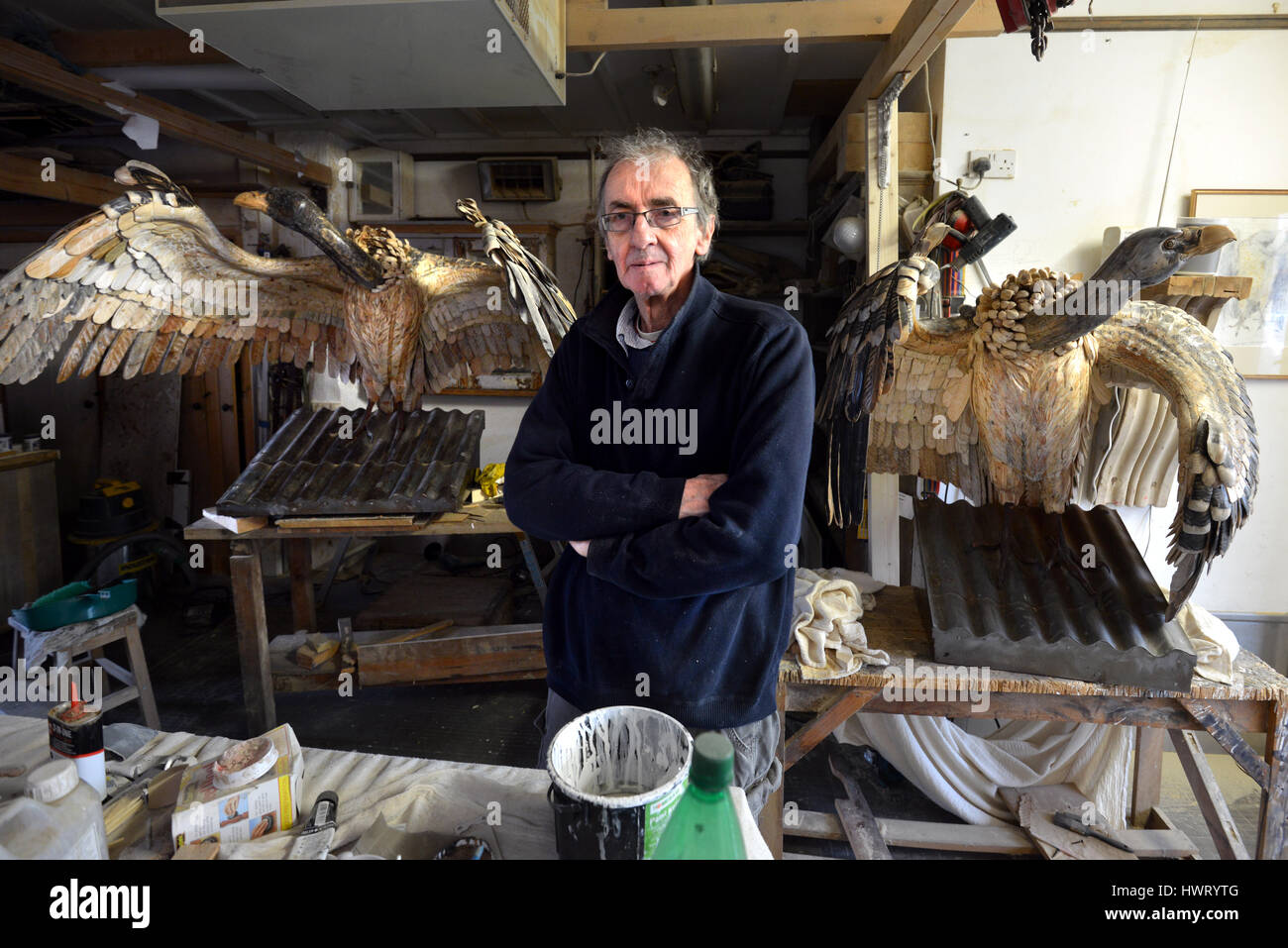 Artist Nick Johnson in his Lewes workshop with two giant sculptures of ...