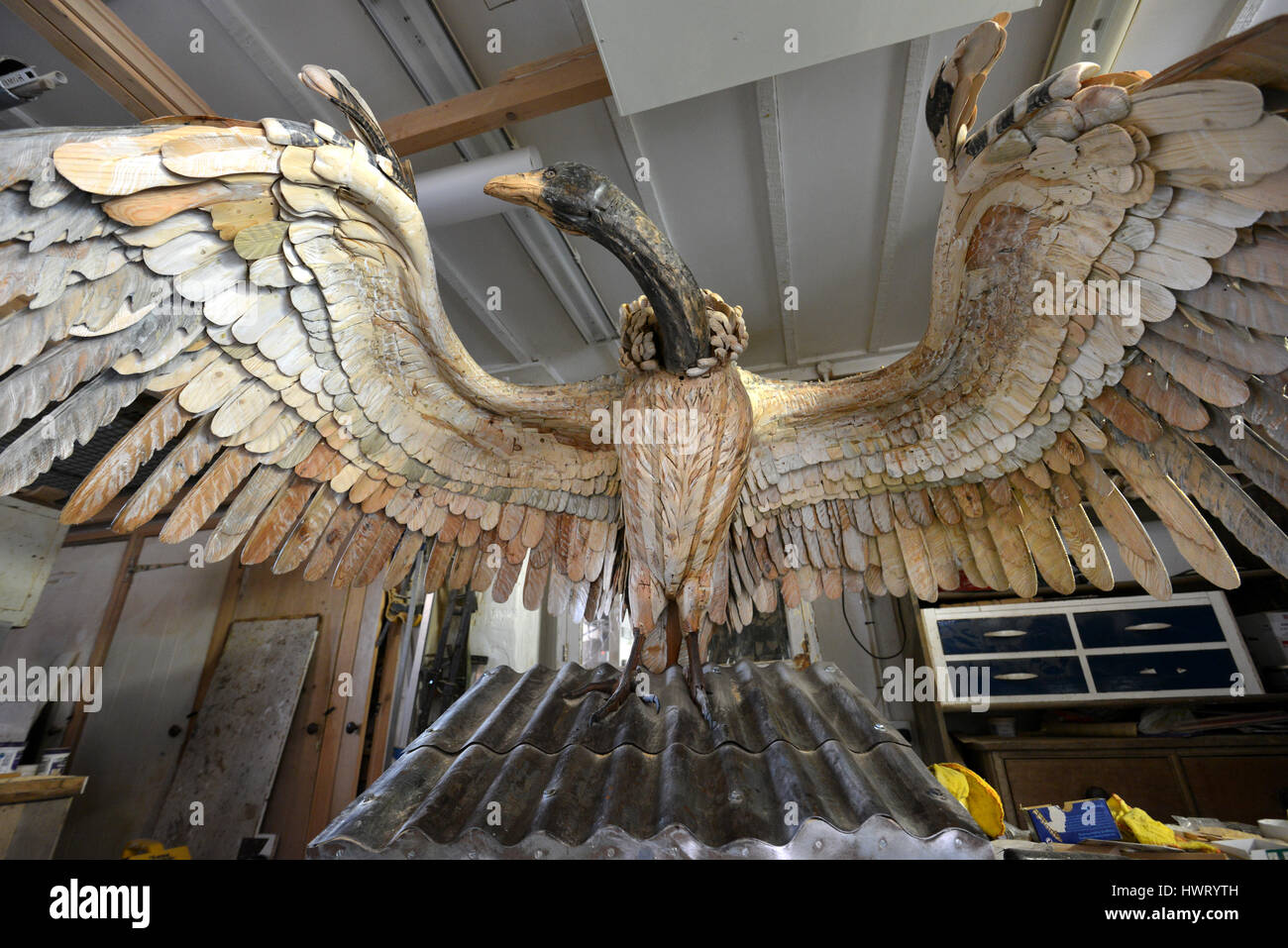 Artist Nick Johnson in his Lewes workshop with two giant sculptures of ...