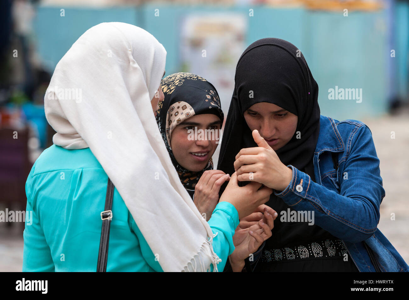 Chefchaouen, Morocco. Young Moroccan Women Checking a Cell Phone Stock ...
