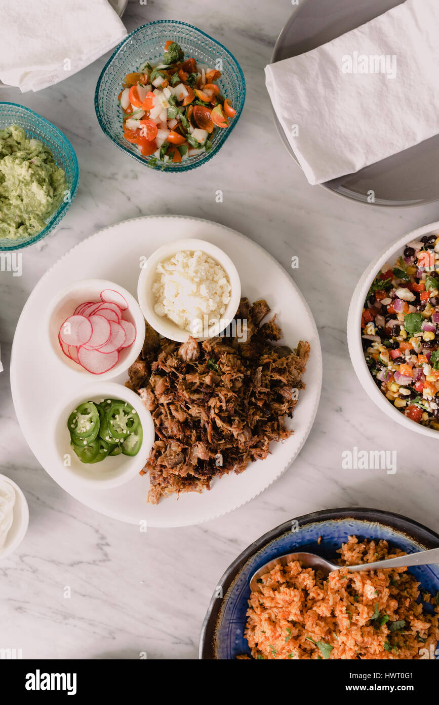 High angle view of food served in plates on table Stock Photo - Alamy