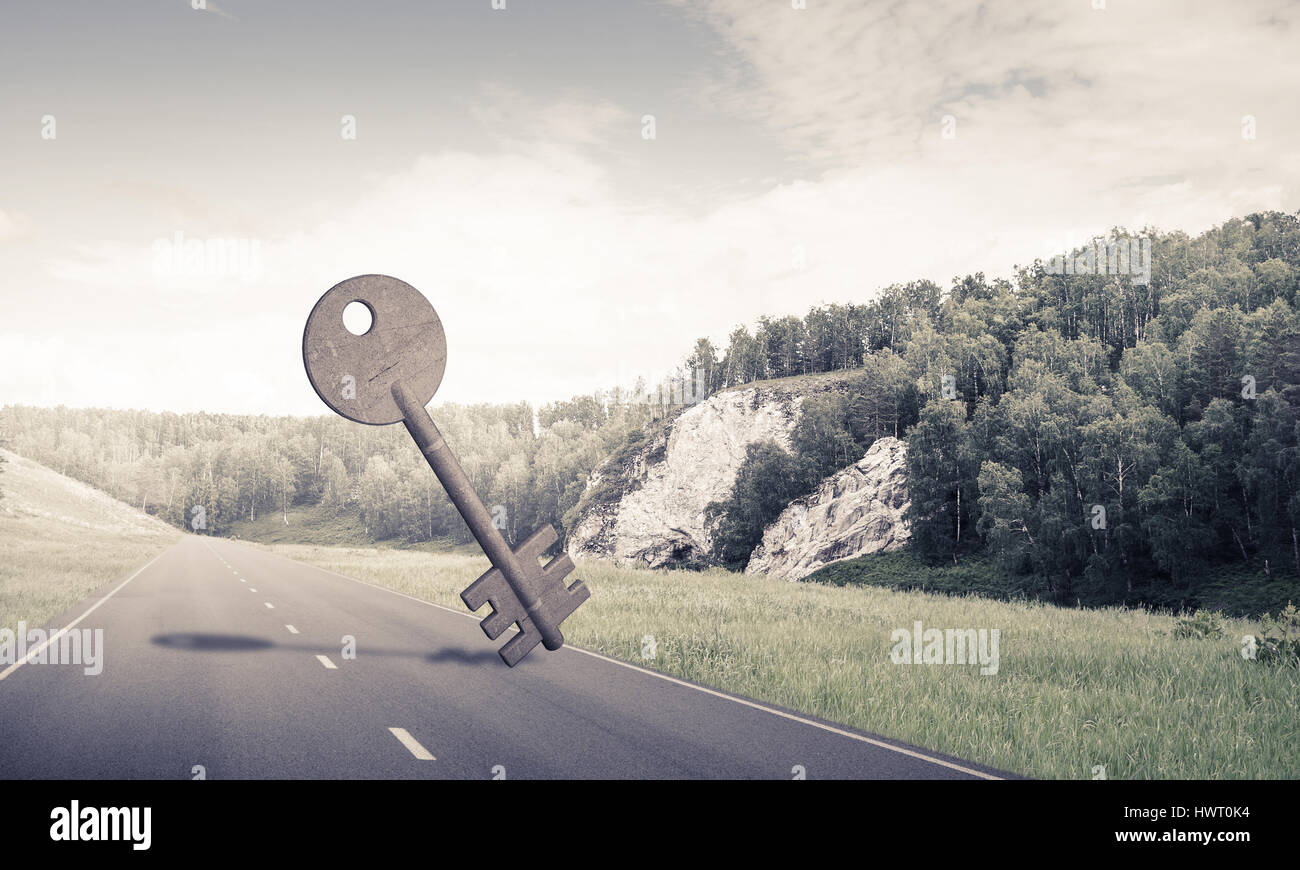 Conceptual background image of concrete key sign on asphalt road Stock ...