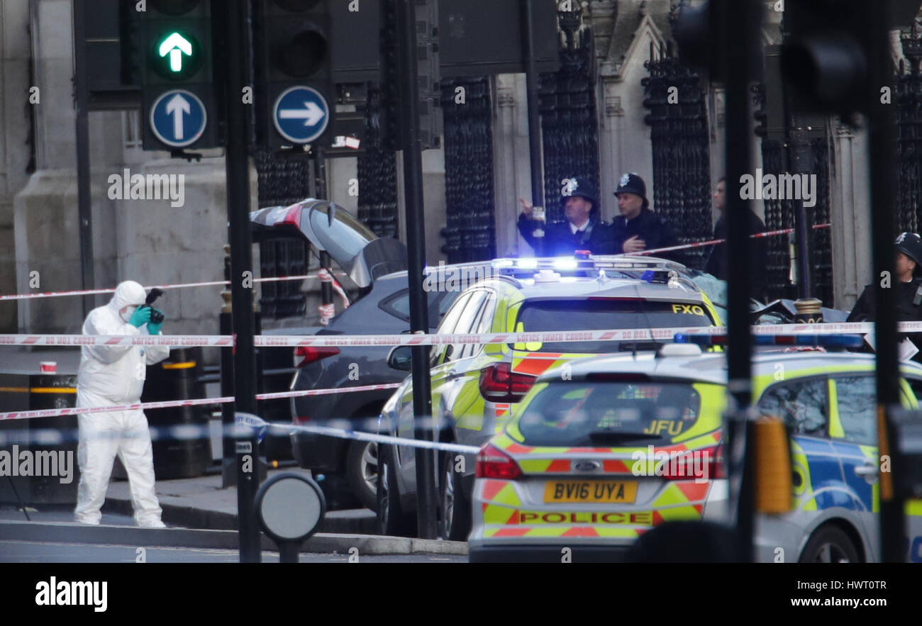 Police forensic officers close to the Palace of Westminster, London ...