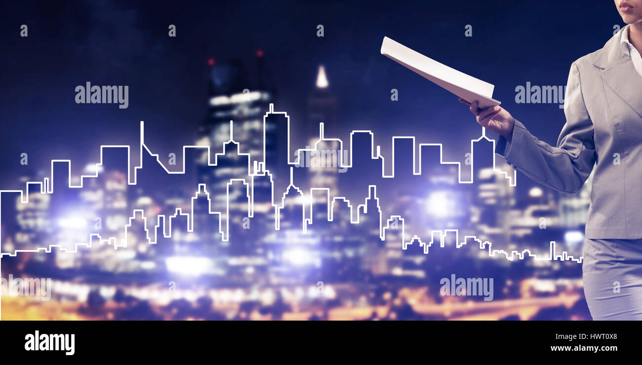 Woman architect or engineer presenting construction concept and Stock ...