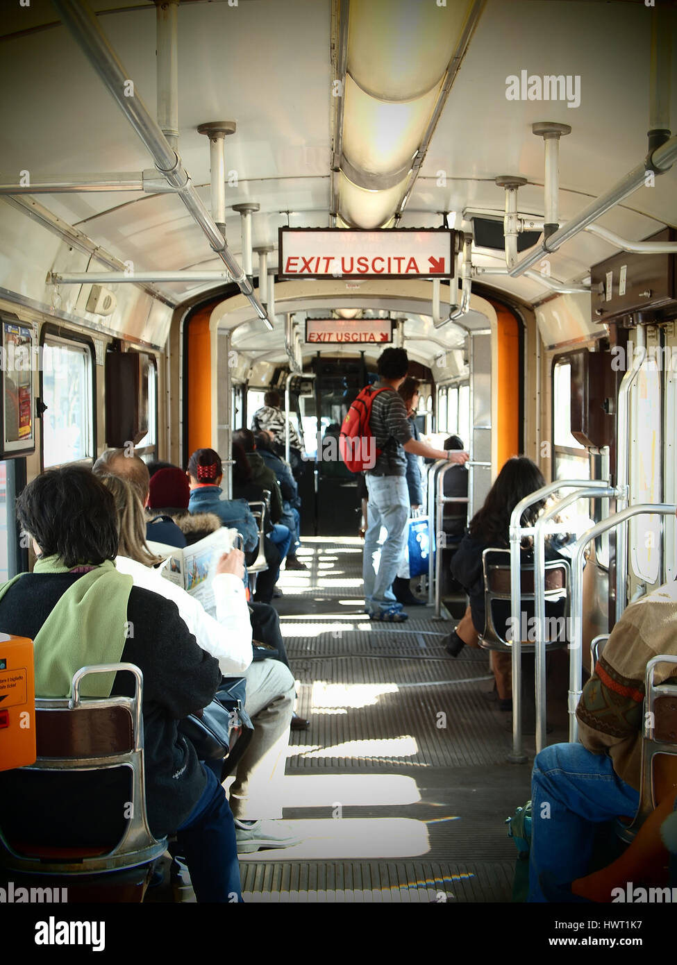 People travelling inside a tram Stock Photo - Alamy