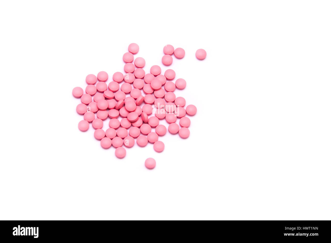 Pink pills isolated on white background. Medicine concept Stock Photo ...