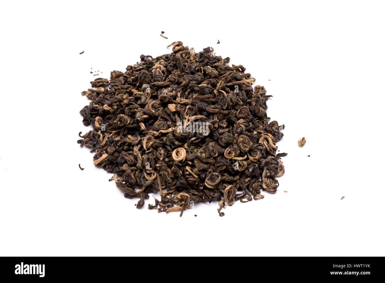 Pile of dried green tea isolated on white background Stock Photo - Alamy