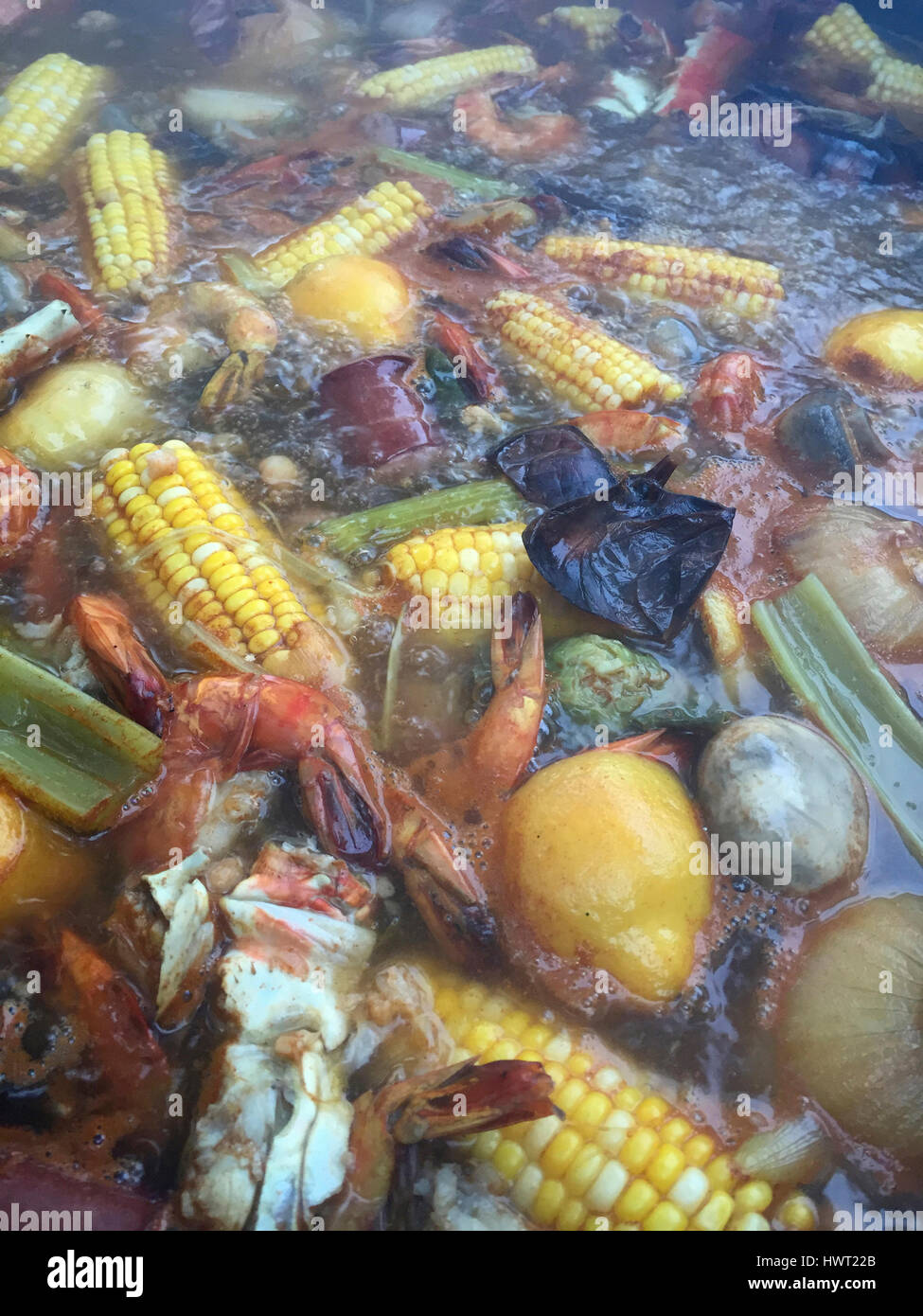 High angle close-up of food cooking in container Stock Photo - Alamy