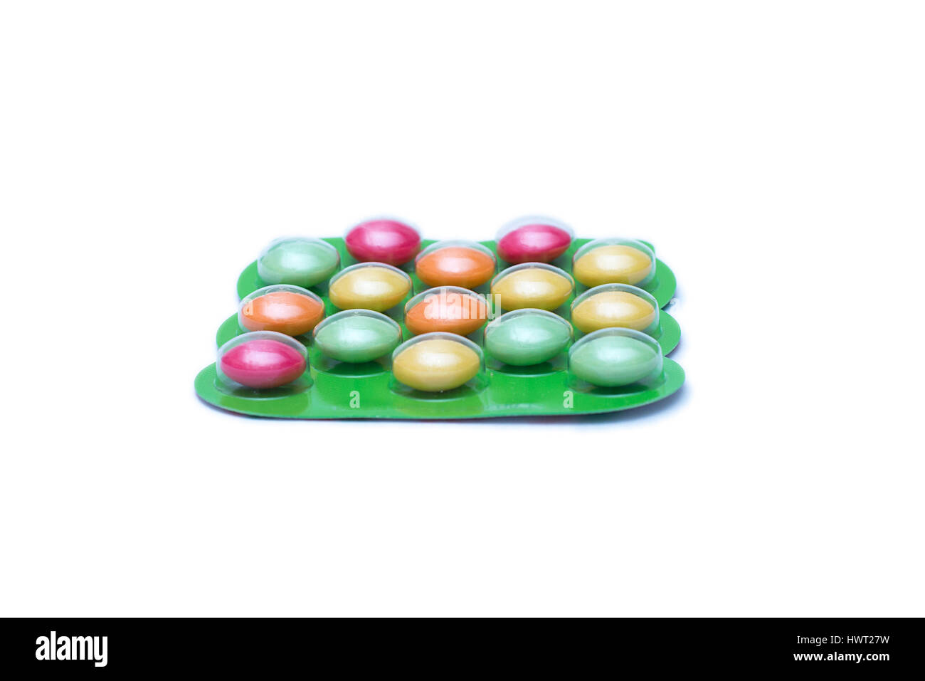 Colorful Pills for Kids in the plastic packaging isolated on white ...