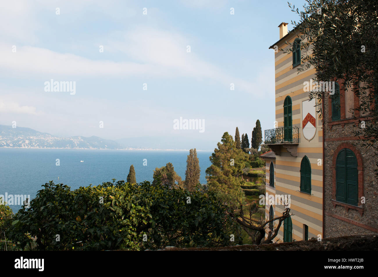 Italy: building and landscape seen from the walking trail on the cliff ...