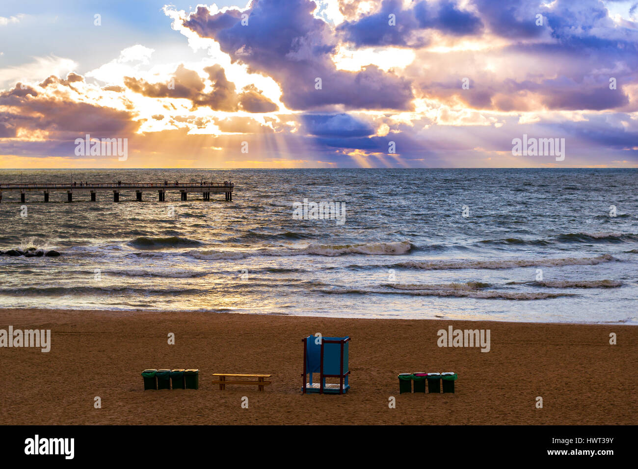 Sunset at Baltic sea in resort of Lithuania Palanga. Rays of sun shine ...