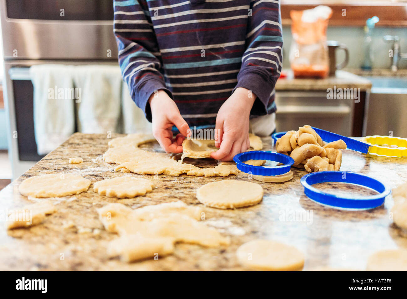 Boy making cookies hi-res stock photography and images - Alamy