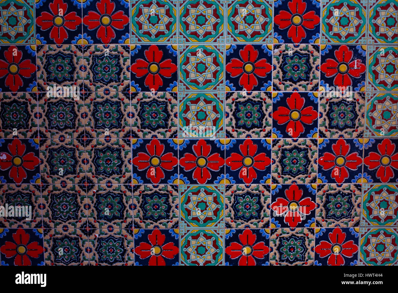 Colorful eramic tiles with flower plant ornament on the wall Stock ...