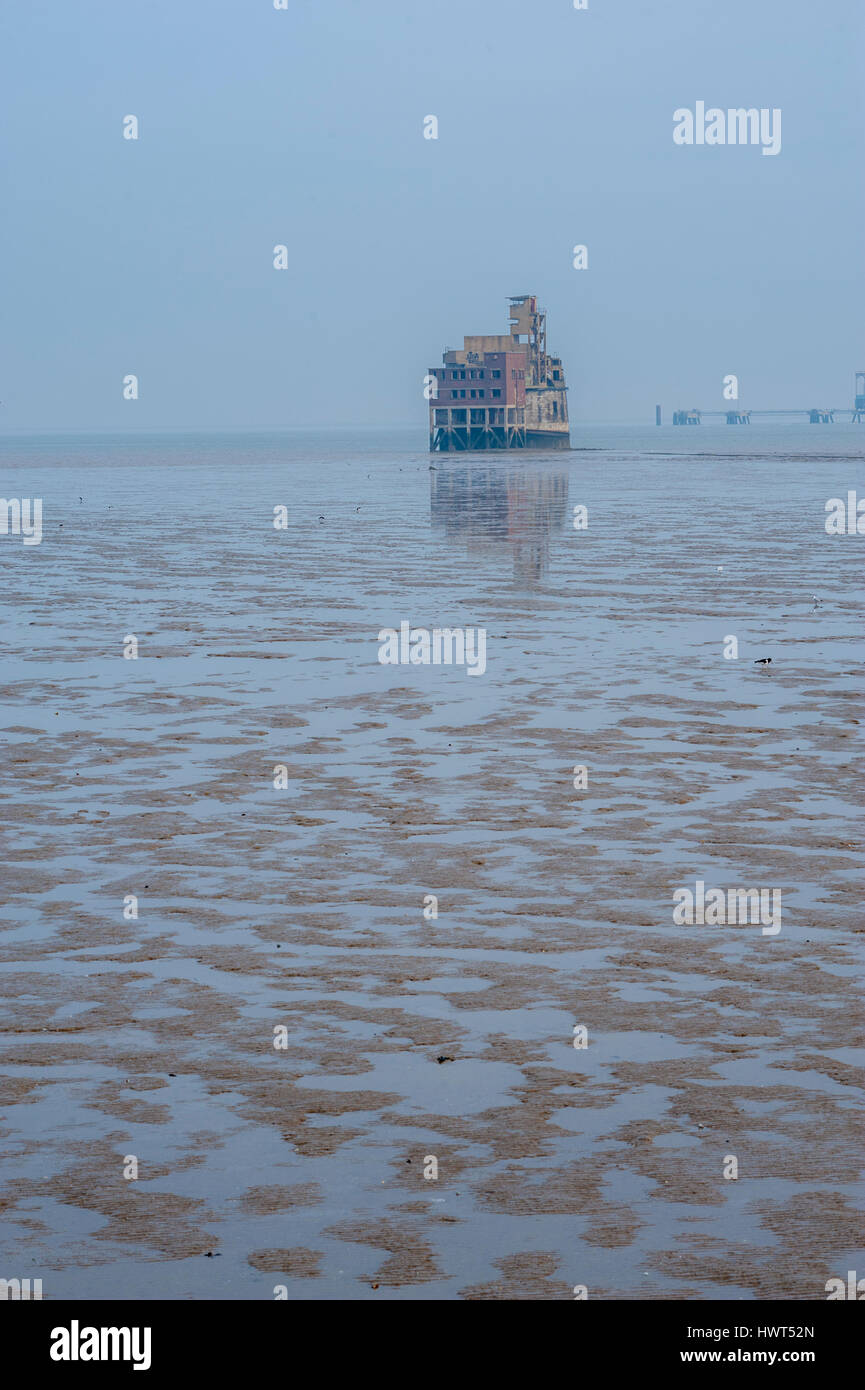 Grain tower in the river Medway Kent. Part of Grain fort which was ...