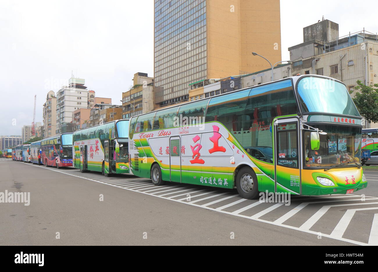 Tour buses park in front of Taiwan Democracy Memorial Park in Taipei ...