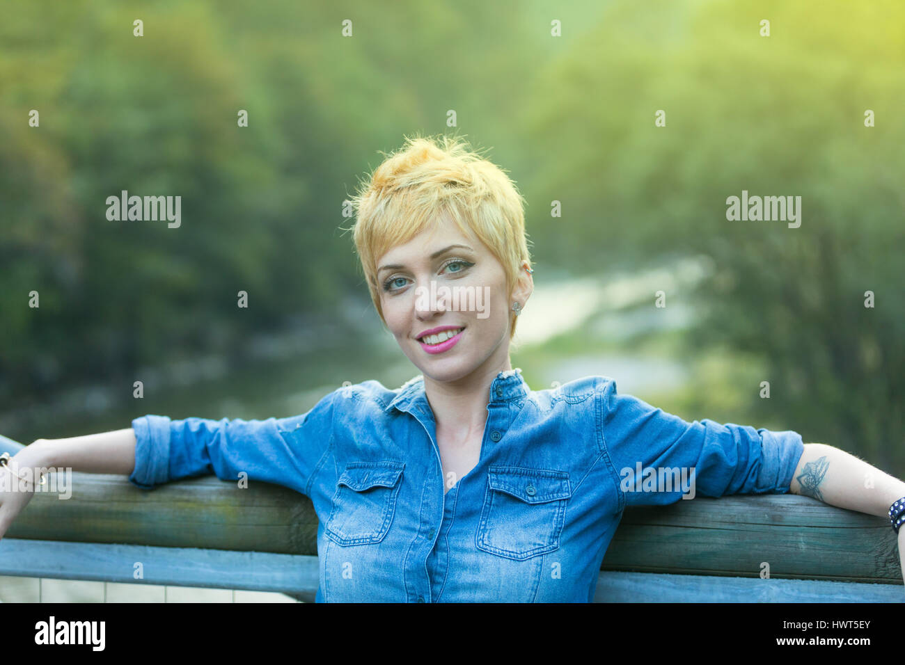 Woman lean against hi-res stock photography and images - Alamy