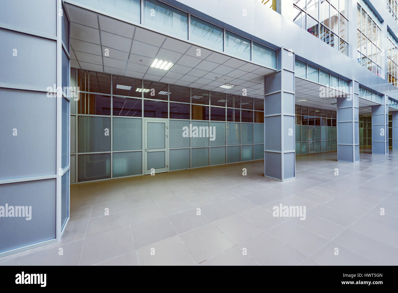 View of the corridor inside the office building Stock Photo - Alamy